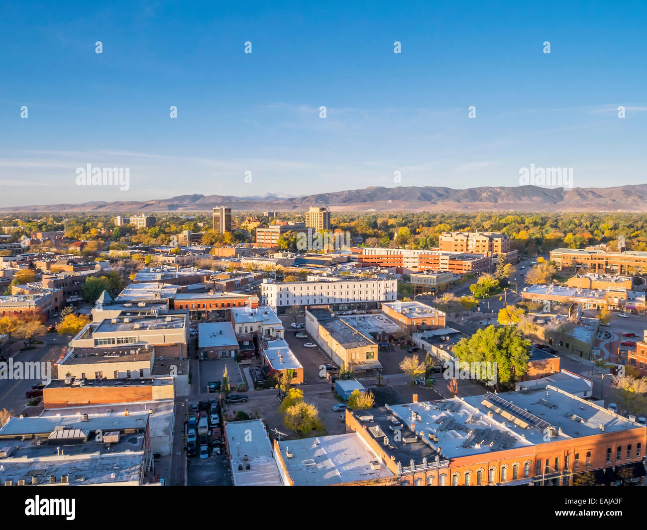 aerial view of Fort Collins downtown in sunrise light, shot from a low ...