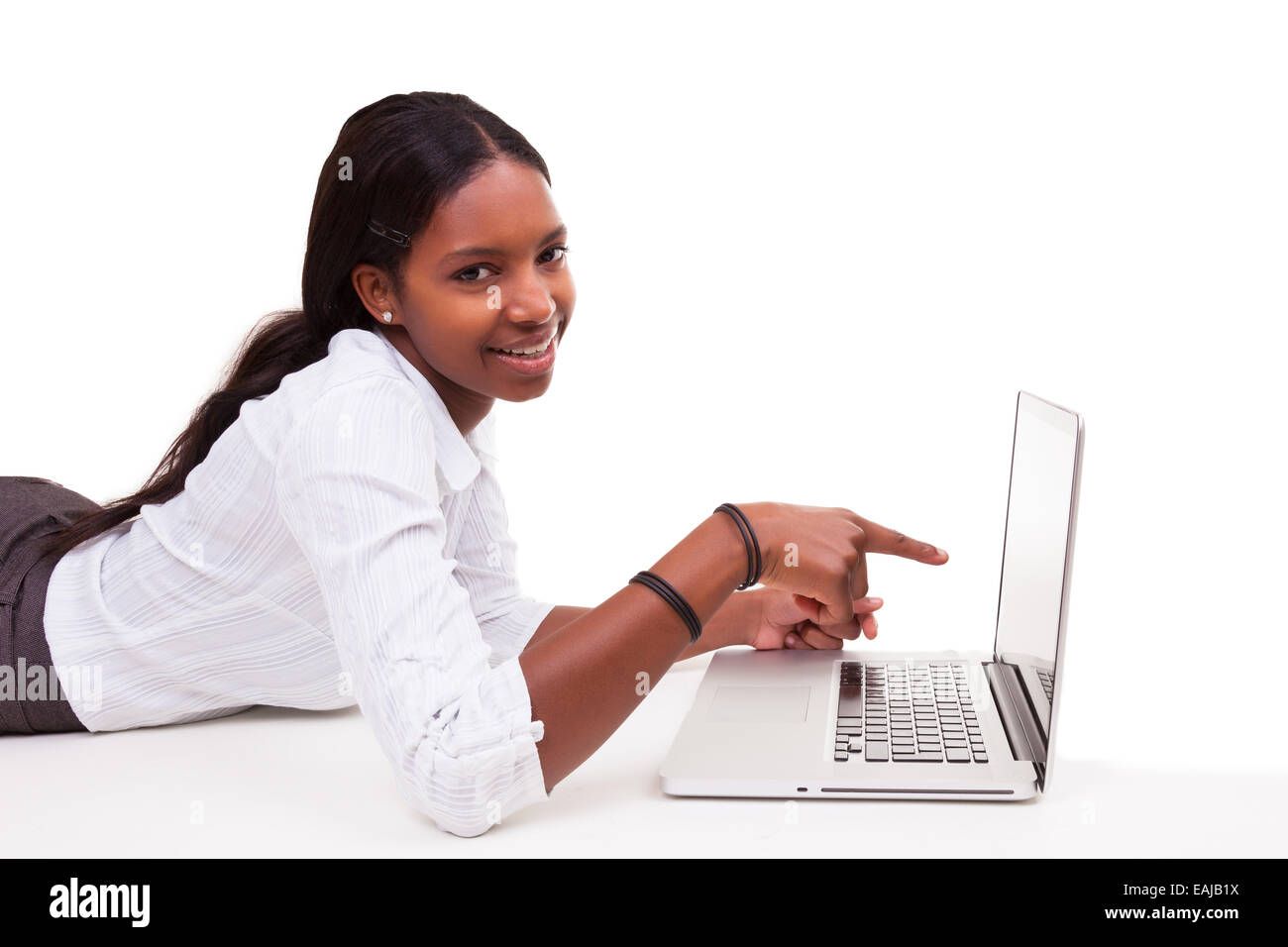 African American woman using a laptop - Black people , isolated on ...