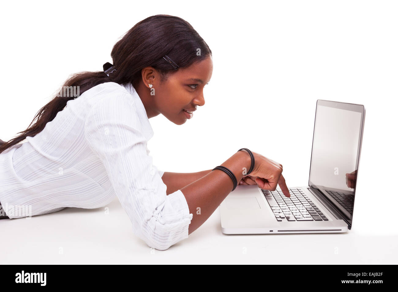 African American woman using a laptop - Black people , isolated on ...