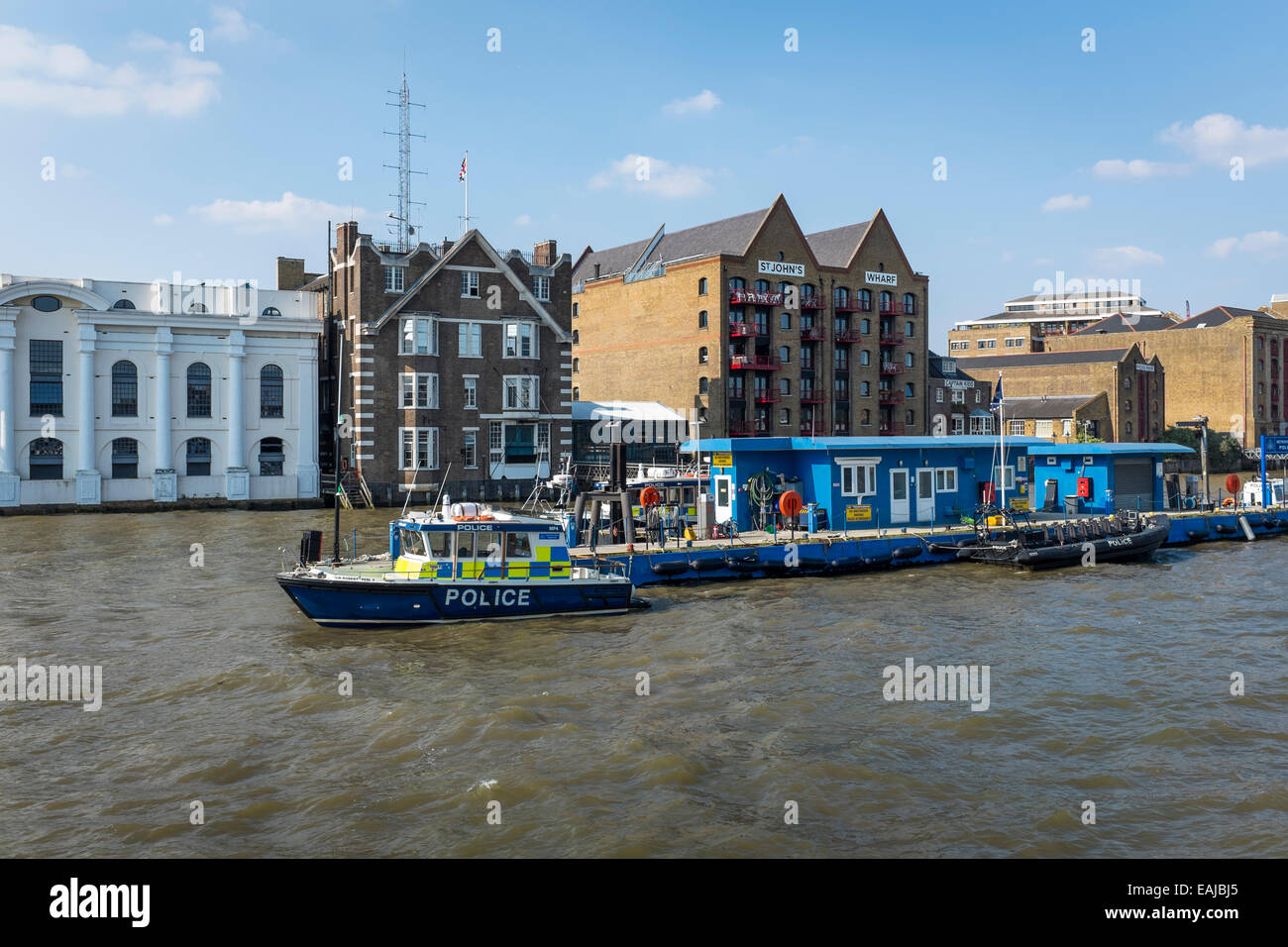 River police boats moored on the floating pontoon at St John's Wharf ...