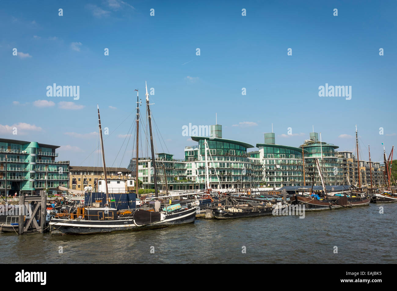 House boats and barges moored at Wapping on the north bank of the River ...