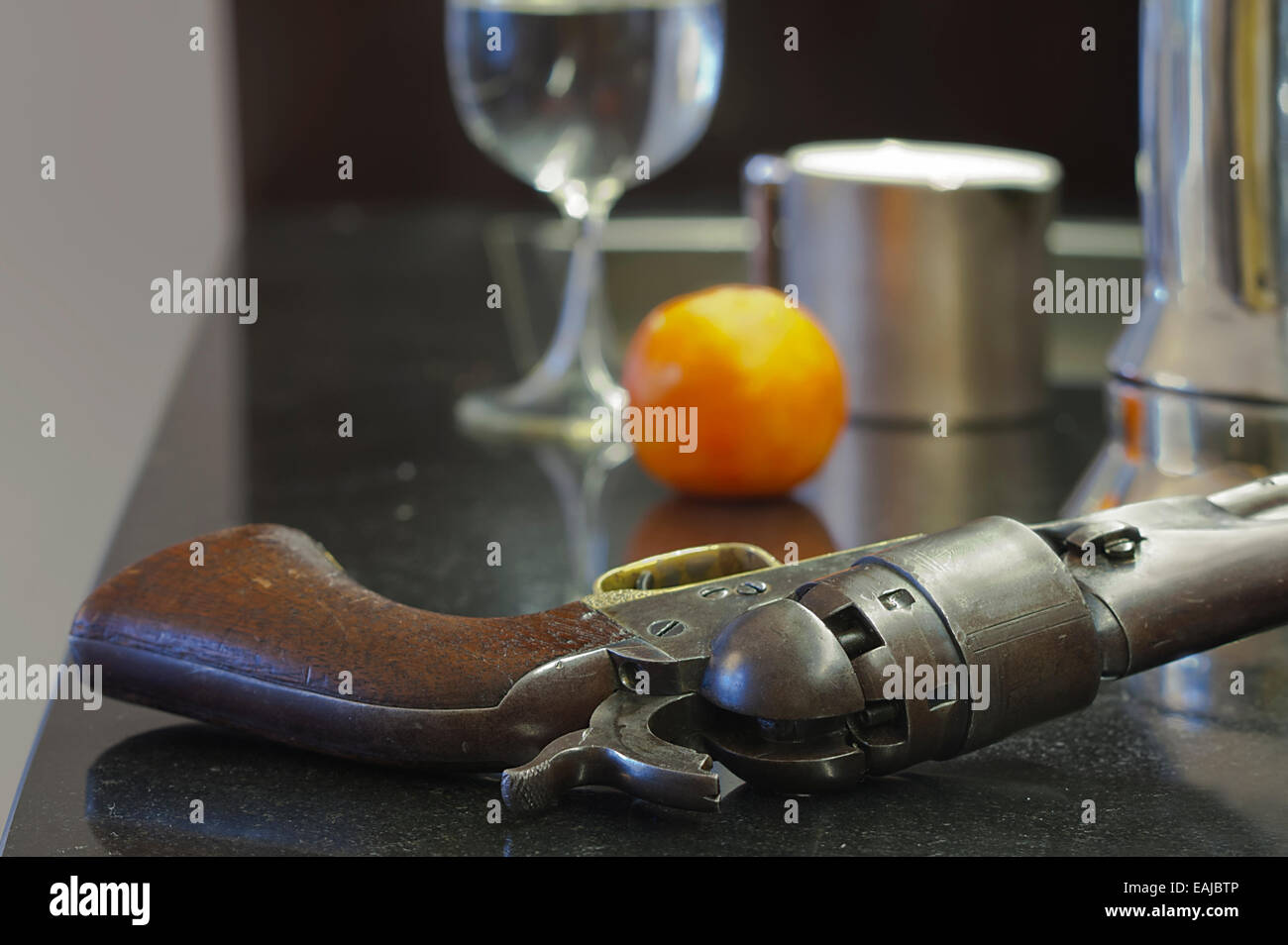 Revolver on the Table Stock Photo - Alamy