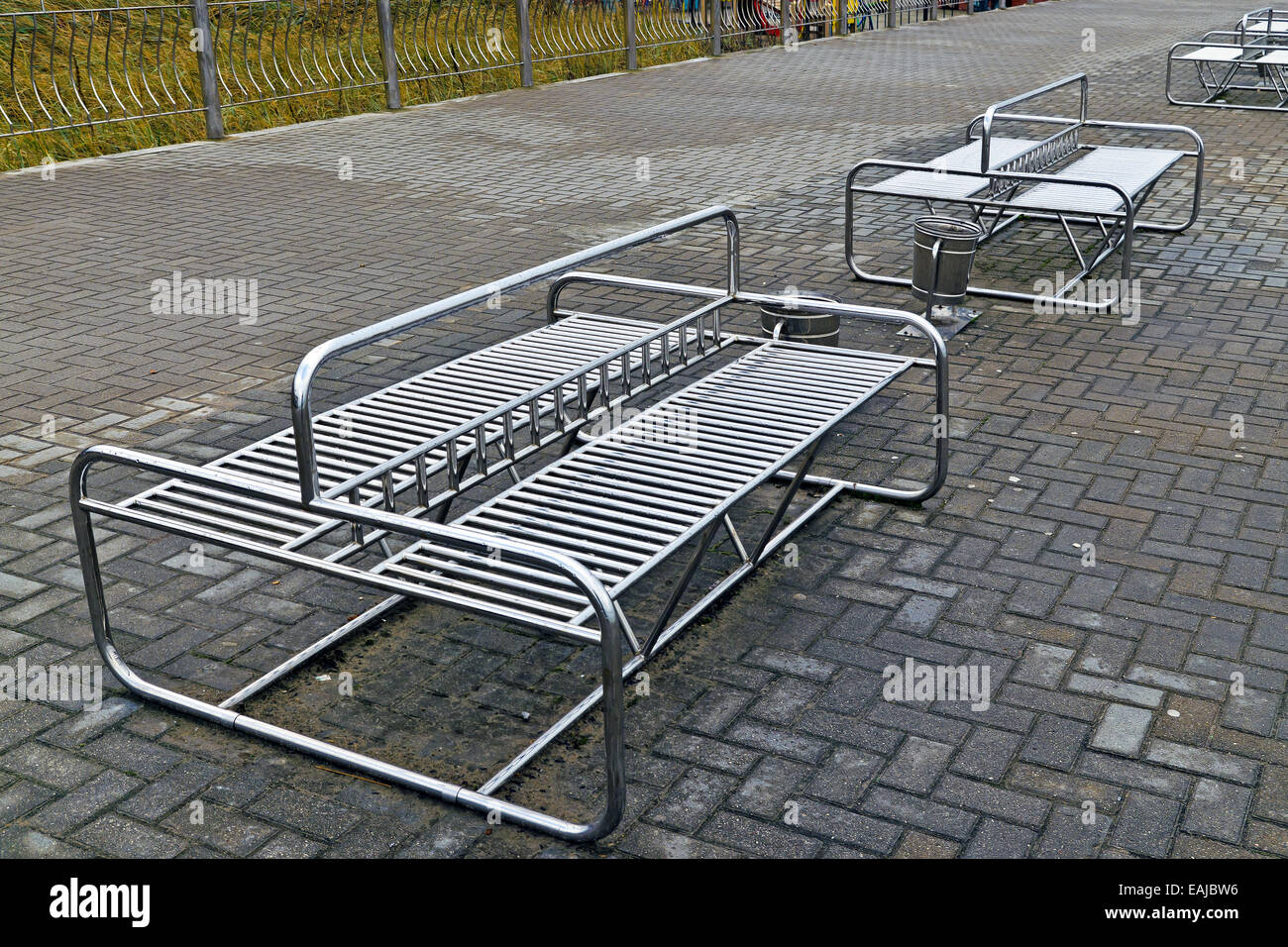 Modern metal benches in the style of hi-tech Stock Photo - Alamy