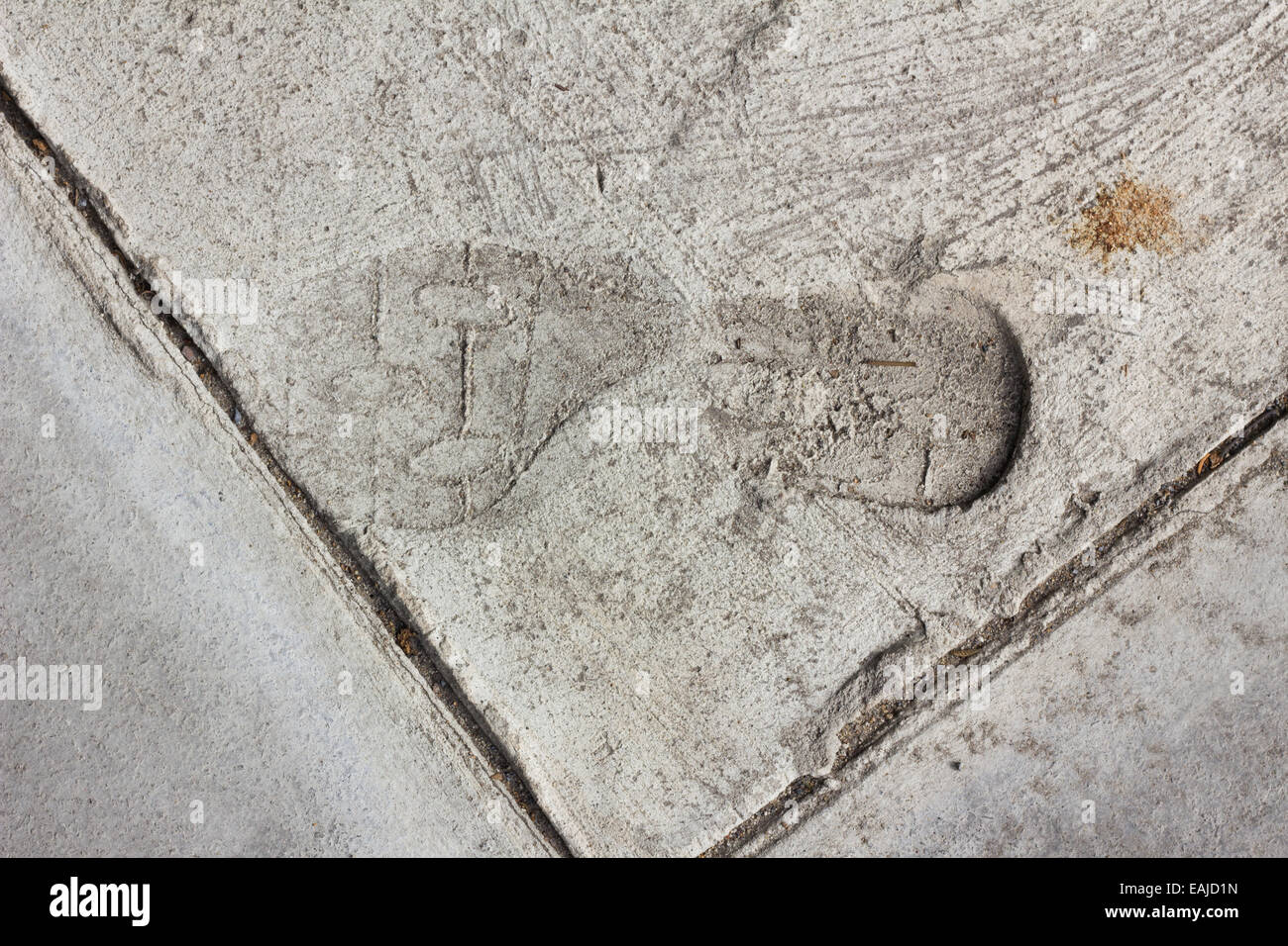Man footprints on concrete track Stock Photo - Alamy