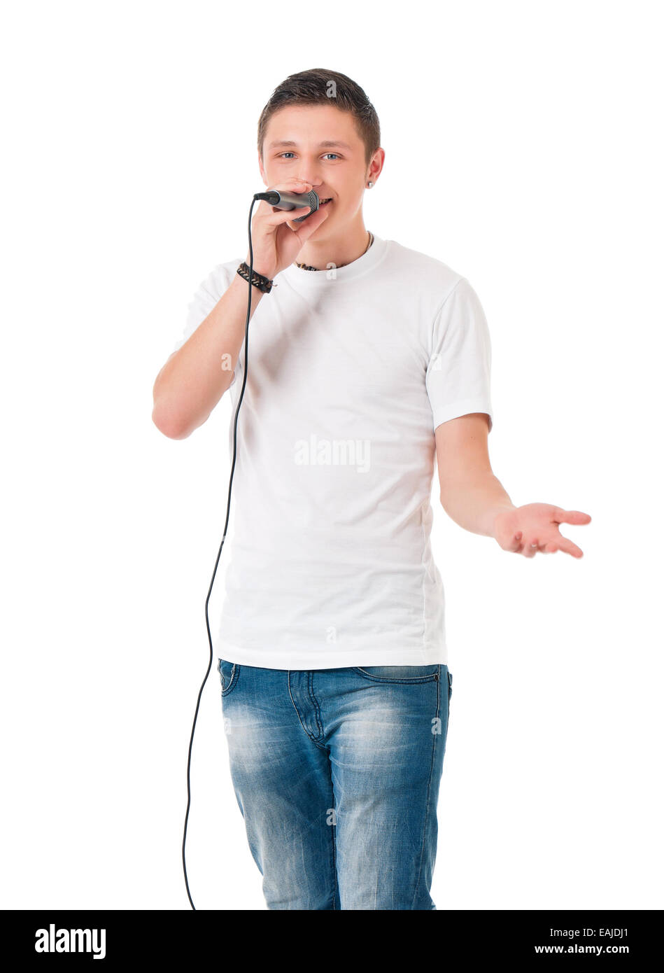Young man with microphone Stock Photo - Alamy