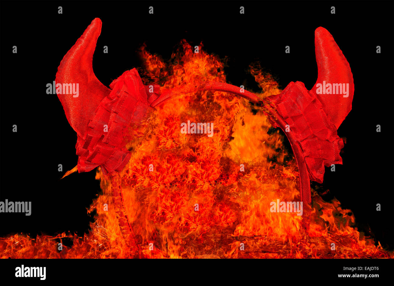 Devil party horns in fire plames, temptation or sin concept Stock Photo ...