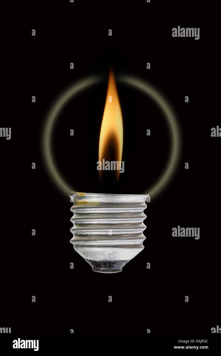 Fire and smoke in side the light bulb. Concept for energy consumption ...