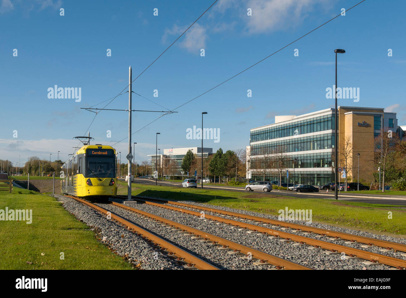 A Metrolink tram passing the Manchester Business Park, on the Airport ...
