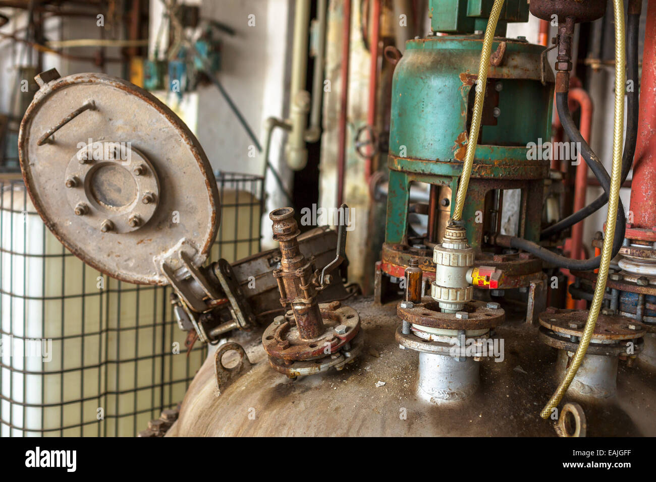 Industrial interior with storage tank Stock Photo - Alamy