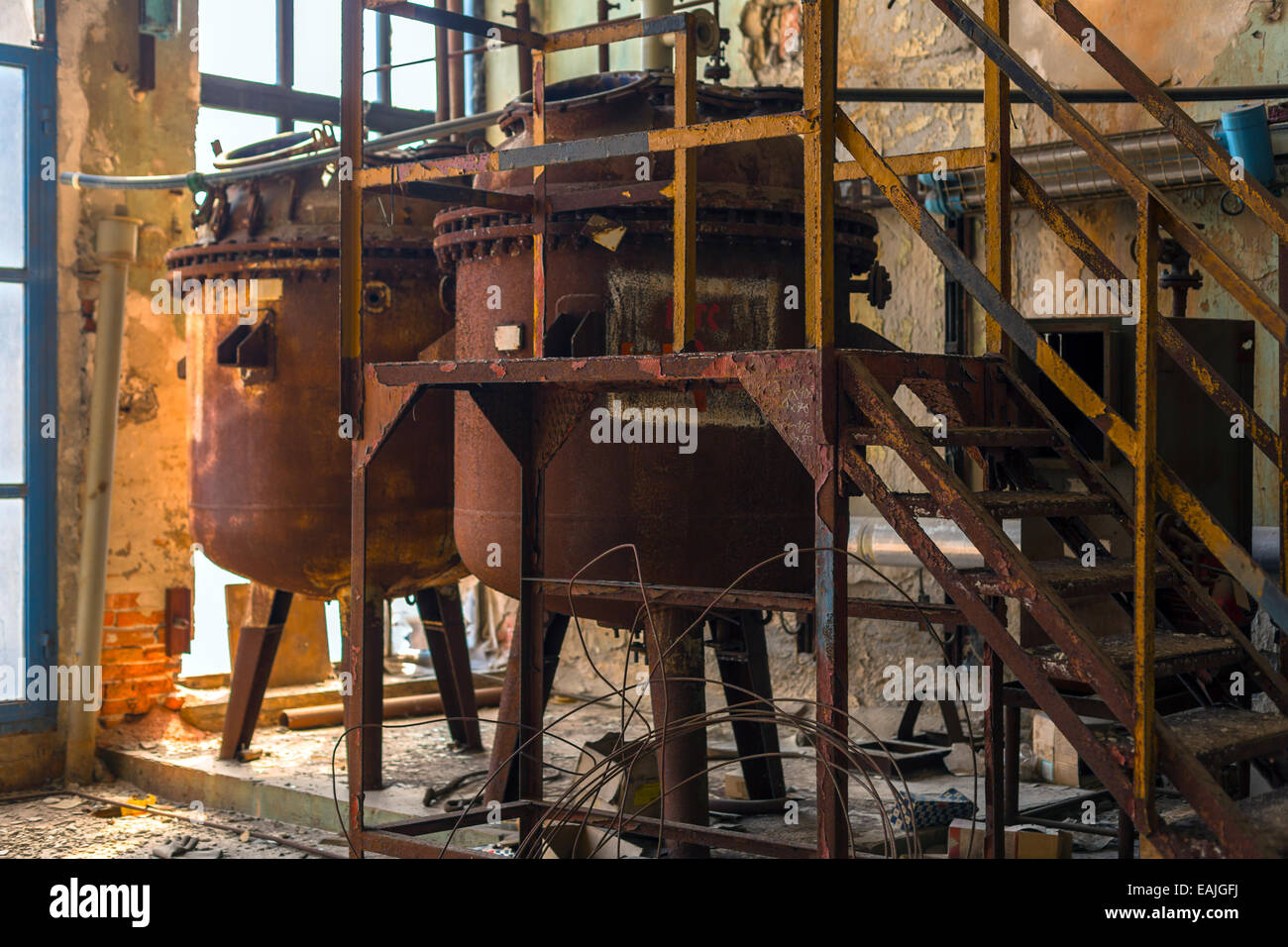 Industrial interior with storage tank Stock Photo - Alamy