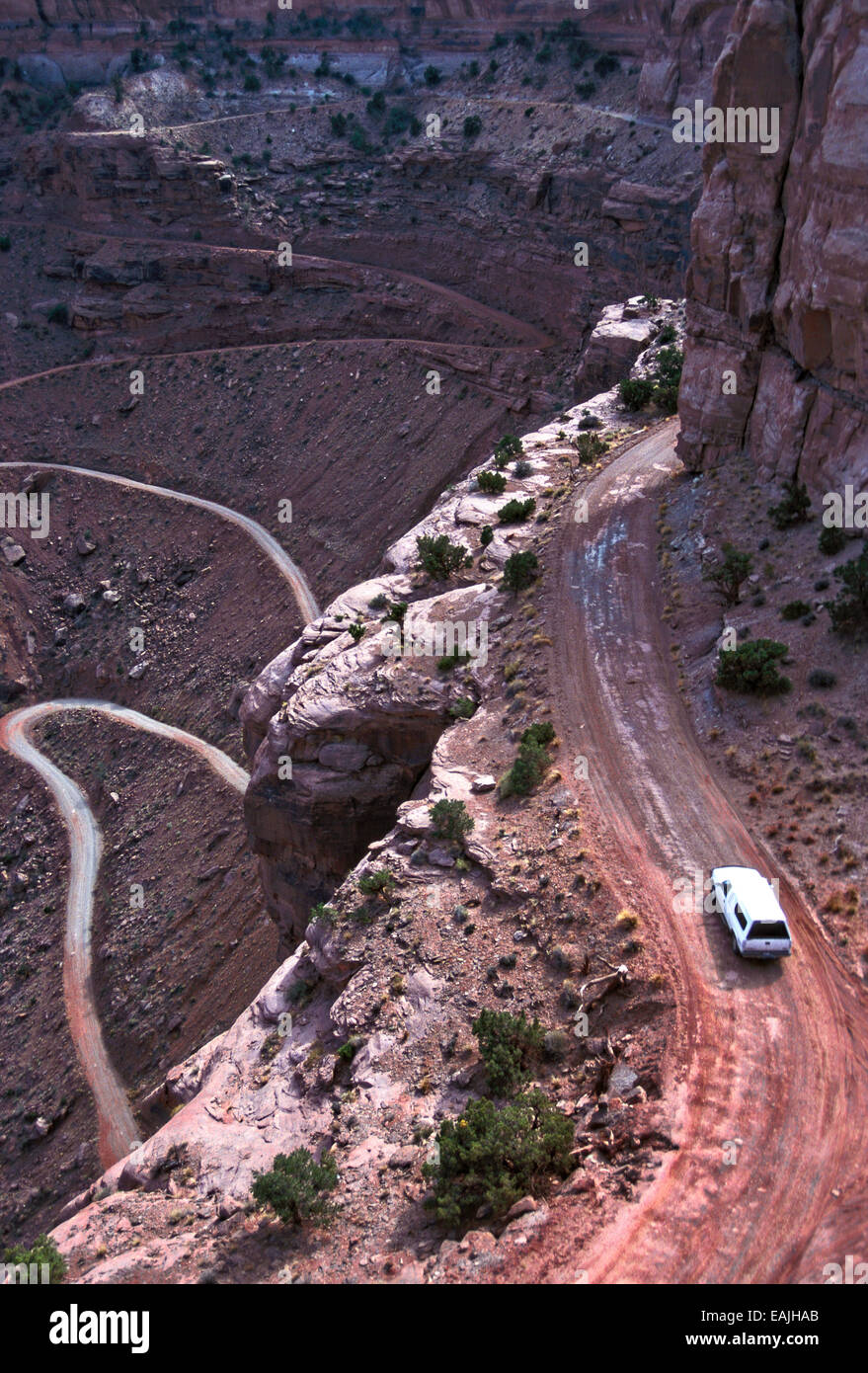 A car drives the switchbacks on the Shafer Trail near Island in the Sky ...