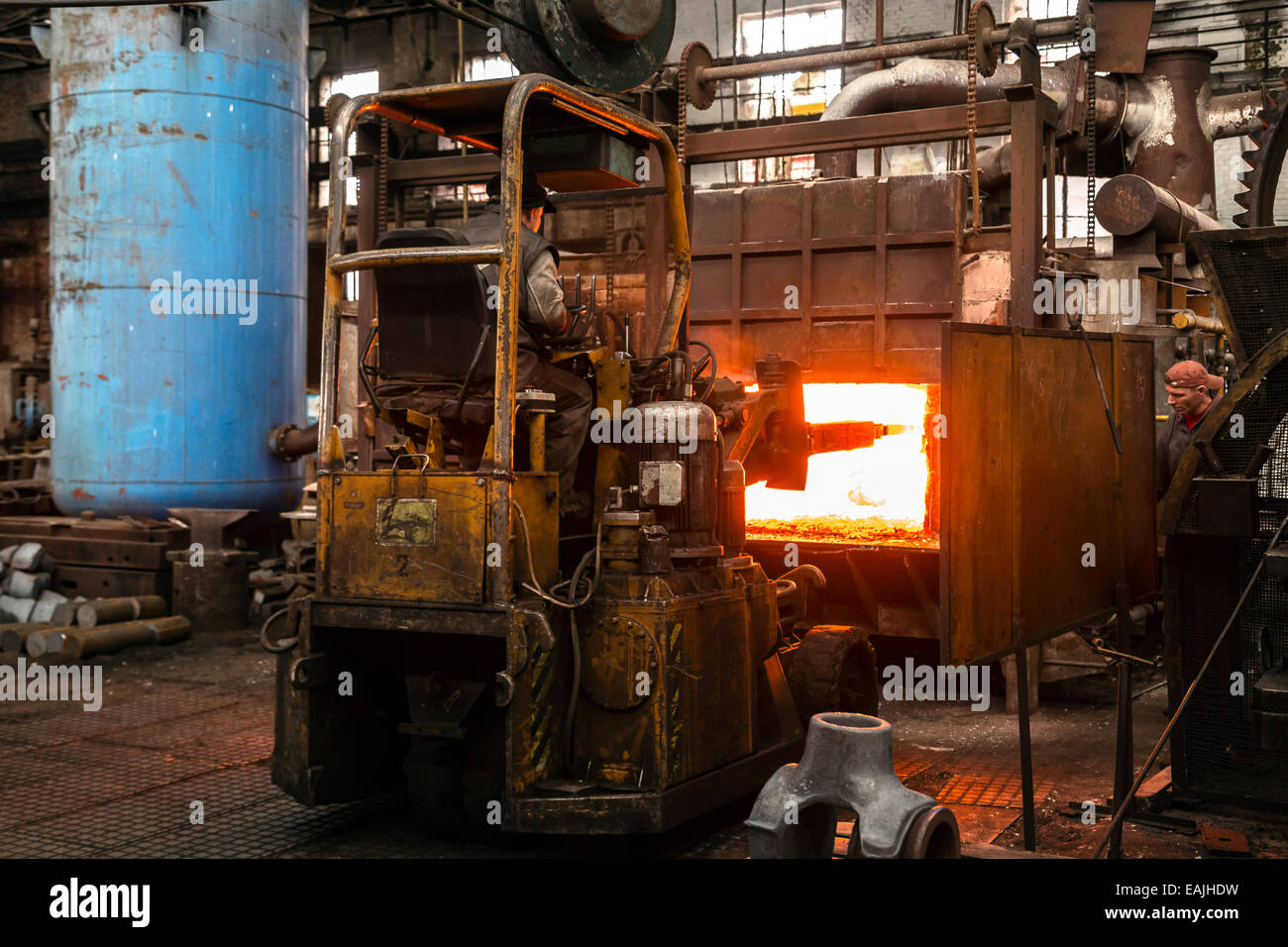 Hard work in a factory Stock Photo - Alamy