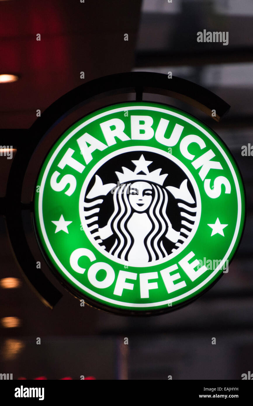 Starbucks coffee shop sign Stock Photo - Alamy