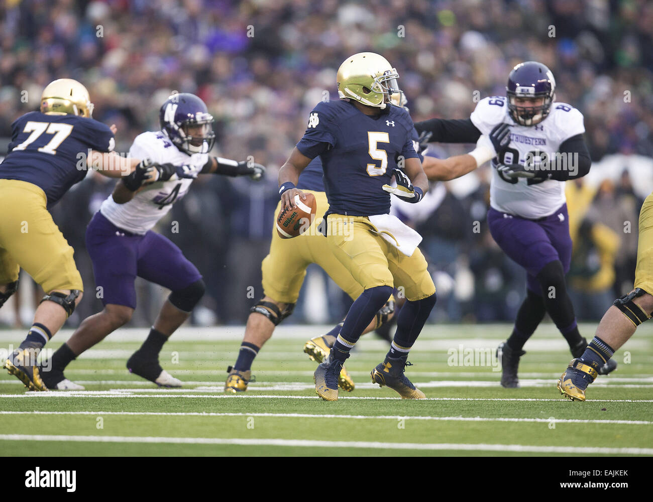 Overtime. 15th Nov, 2014. Notre Dame quarterback Everett Golson (5 ...