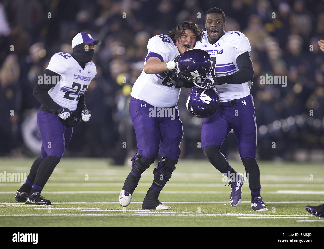 Overtime. 15th Nov, 2014. Northwestern players celebrate after game ...