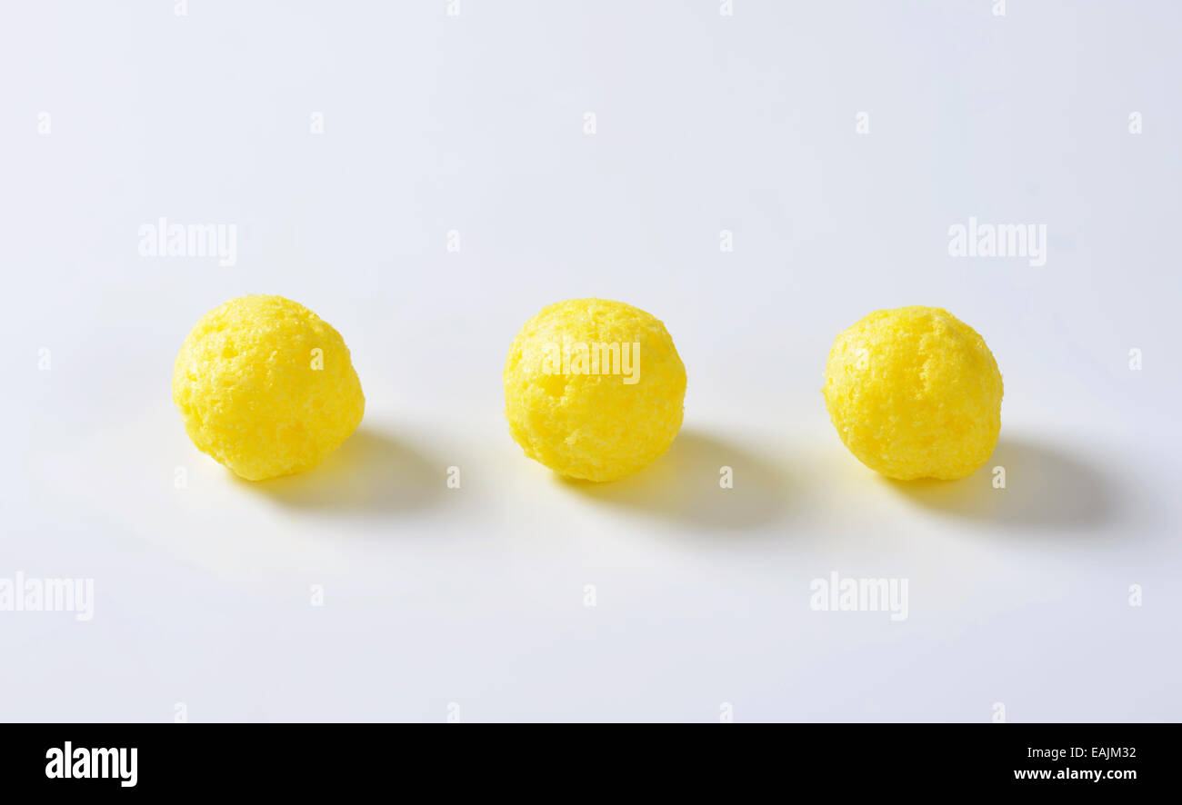 Studio shot of three puffed cereal balls Stock Photo - Alamy