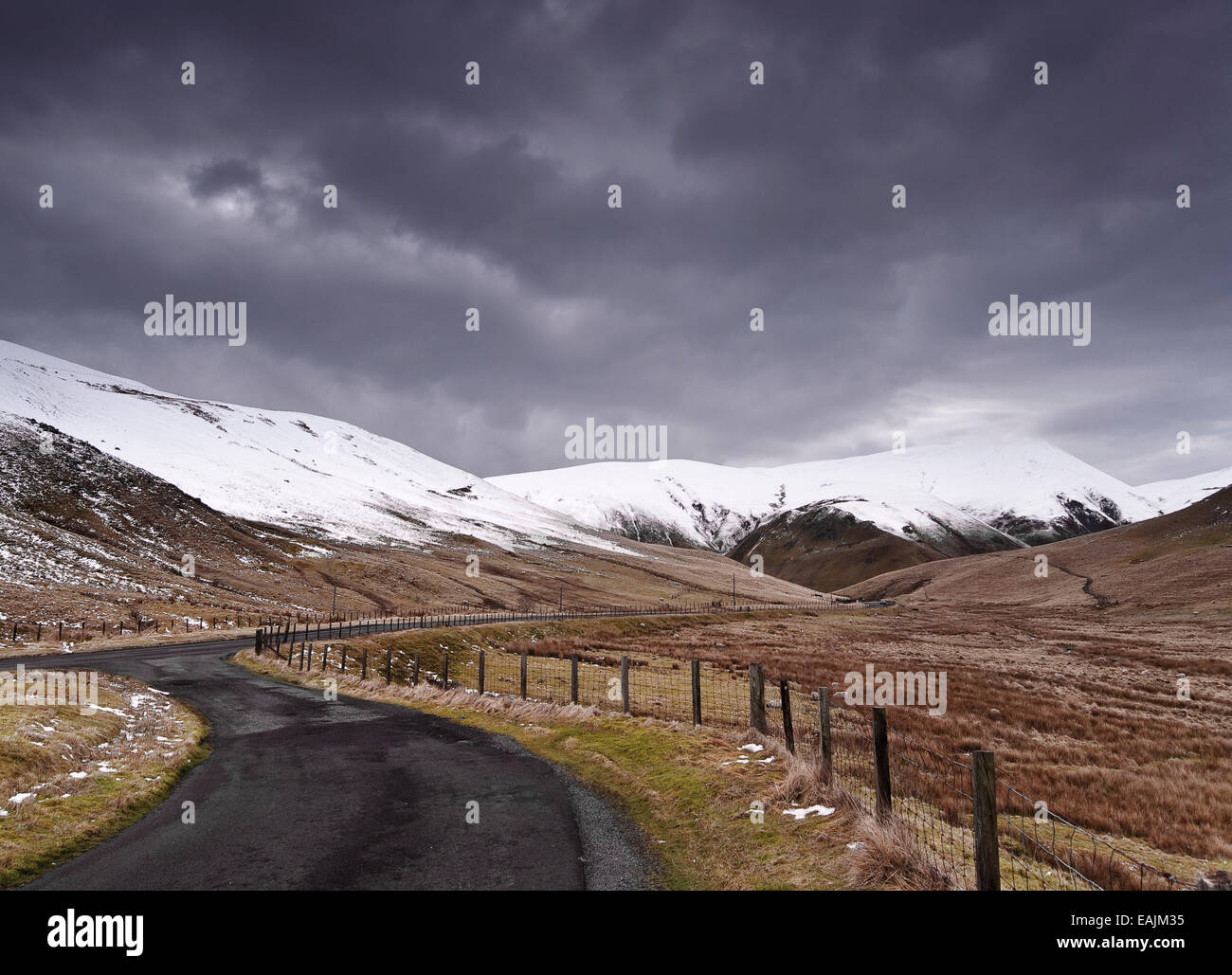 A hilly wintery scene Stock Photo - Alamy