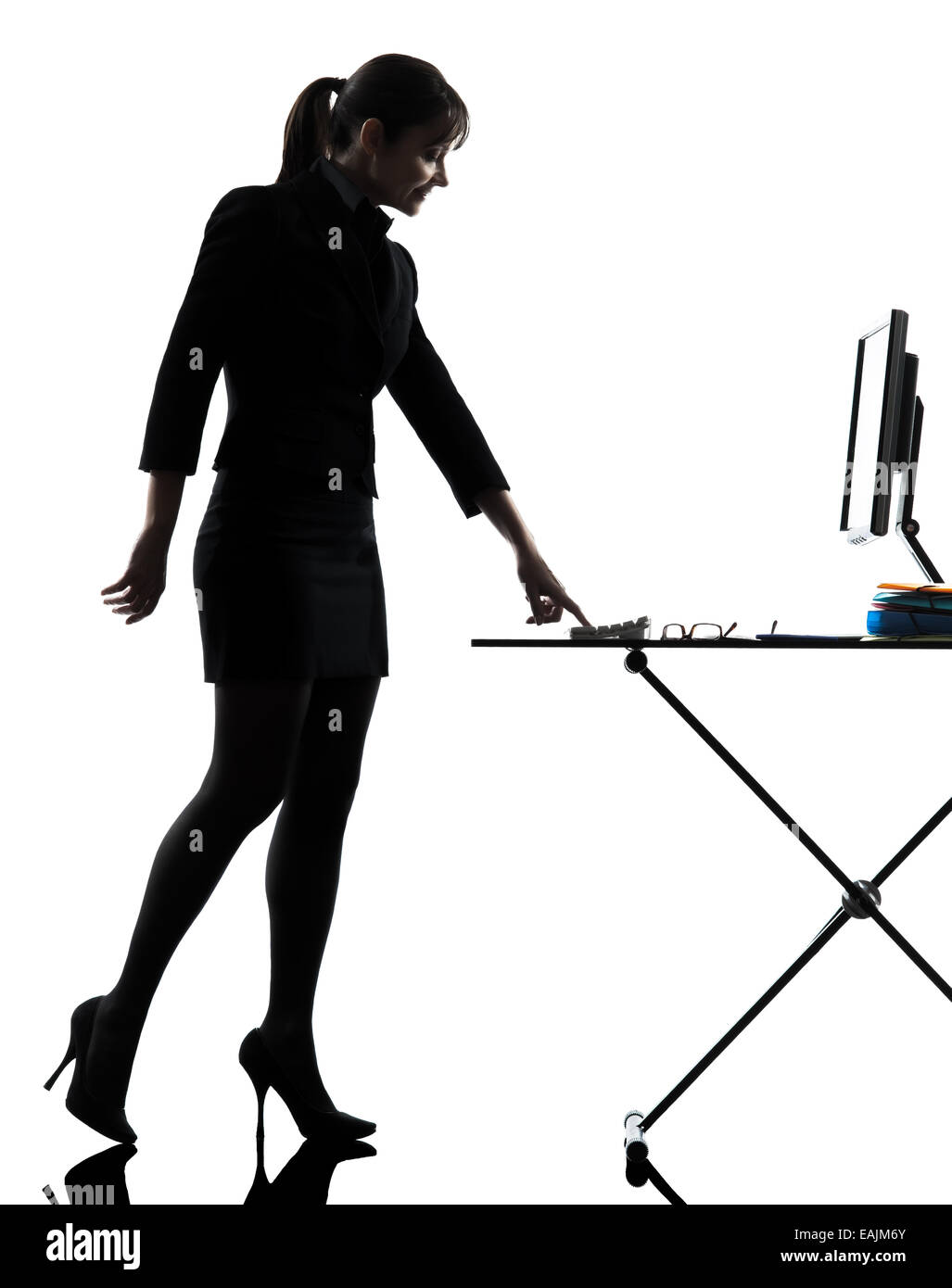 one business woman igniting computer computing silhouette studio ...