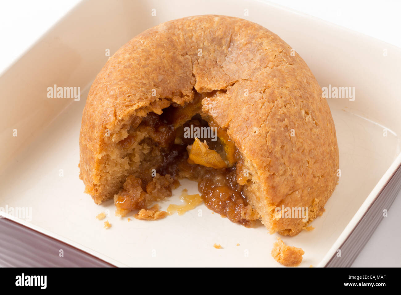 Sussex pond pudding, a steamed British dish filled with a lemon encased ...
