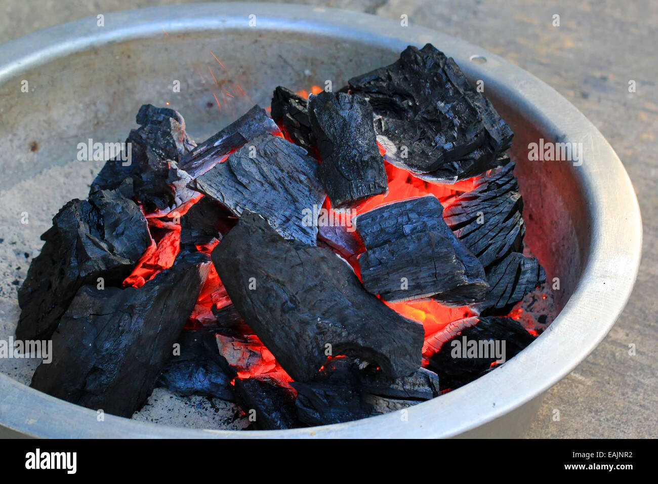 Hot charcoal in the bowl Stock Photo - Alamy