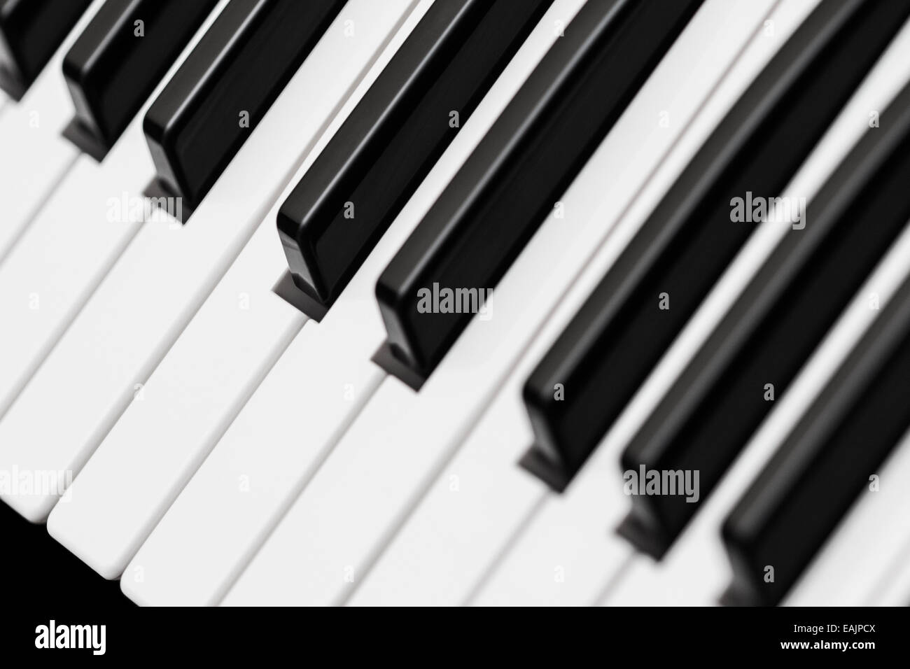 Angled viewpoint of piano keys in black and white Stock Photo - Alamy