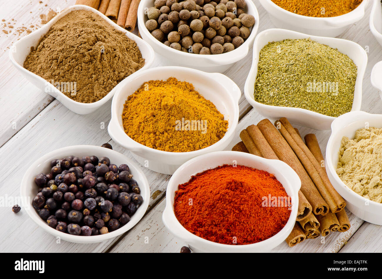 Assortment of powder spices in bowls. Selective focus Stock Photo - Alamy