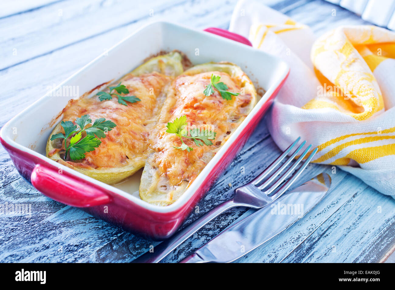 stuffed marrow with chicken meat and cheese Stock Photo - Alamy