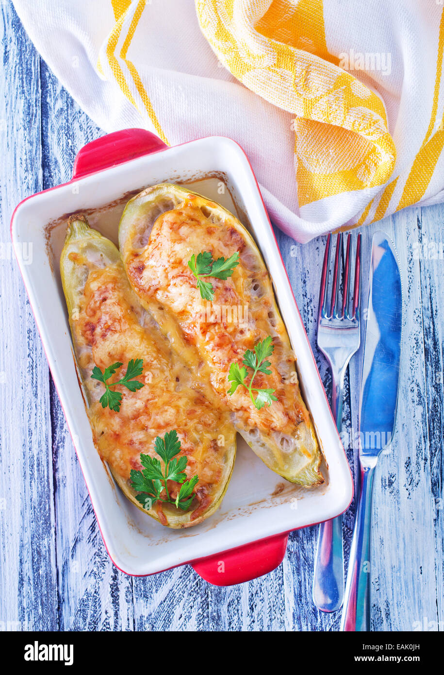 stuffed marrow with chicken meat and cheese Stock Photo - Alamy