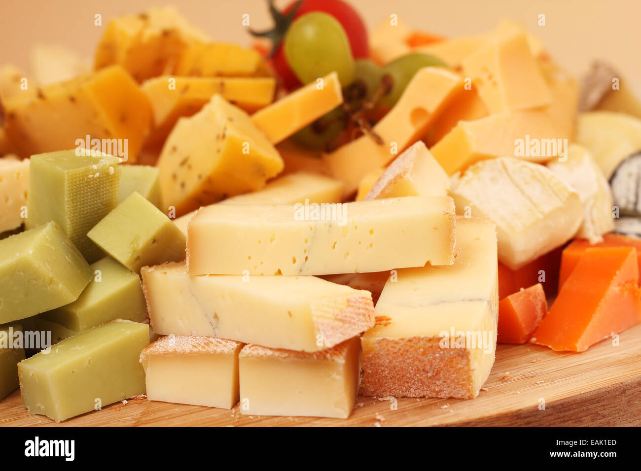 Cut french cheese blocks background close-up Stock Photo - Alamy