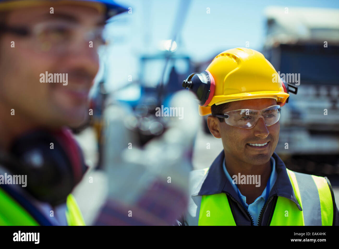 Workers with walkie-talkie Stock Photo - Alamy