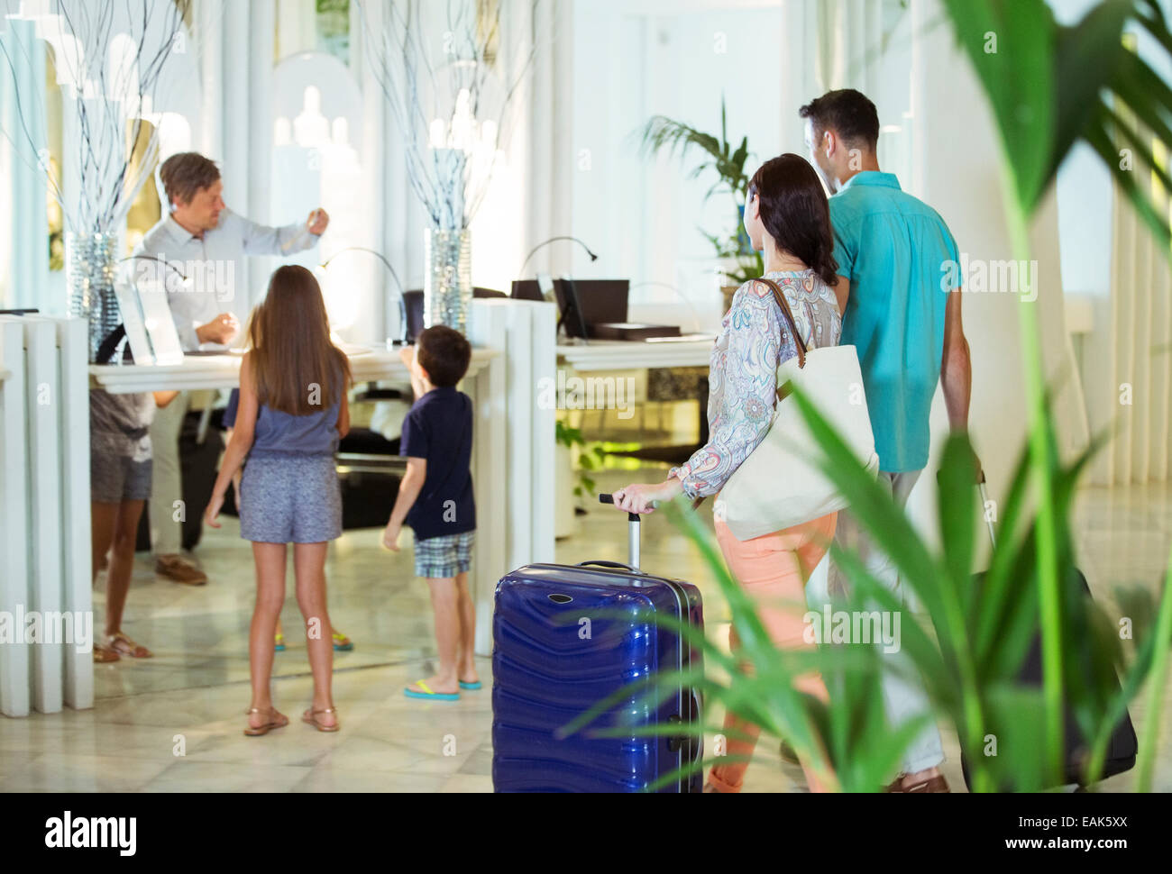 Boy at reception desk hi-res stock photography and images - Alamy