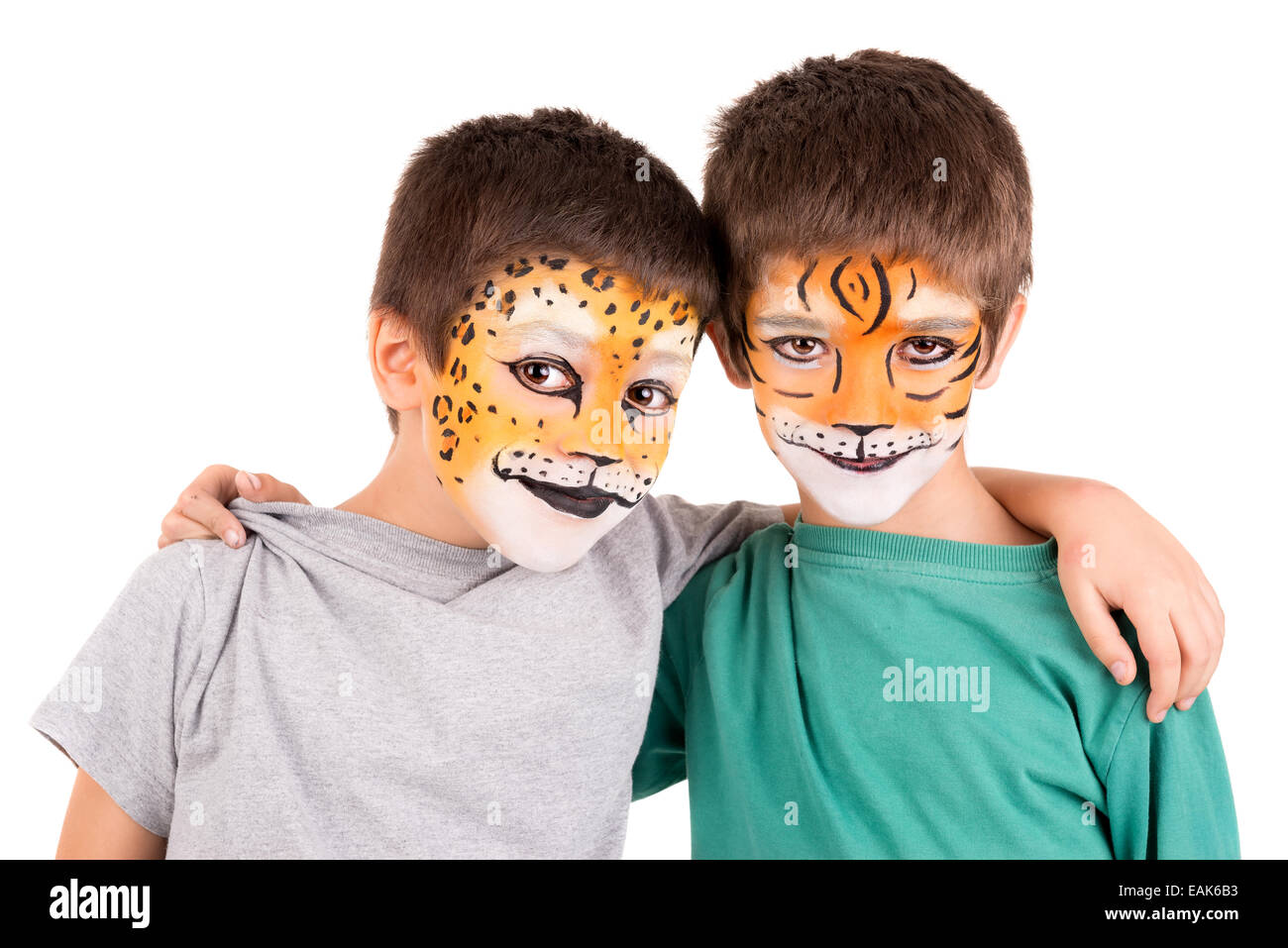 Boys with face-painted like a leopard and tiger isolated in white Stock ...