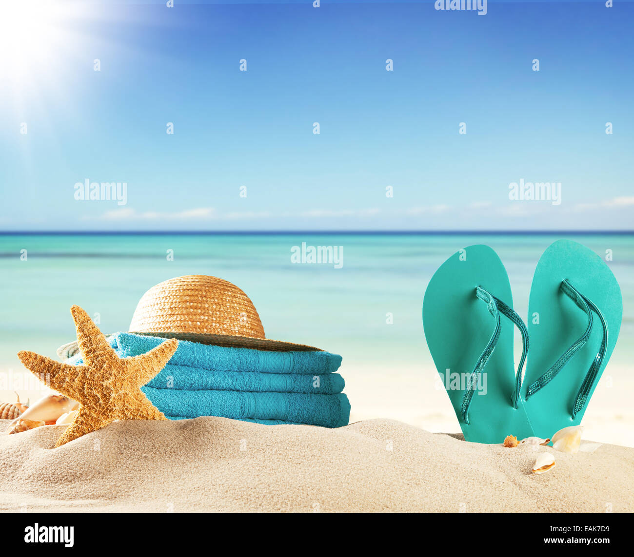 Summer concept with swimming accessories and blur sea on background ...