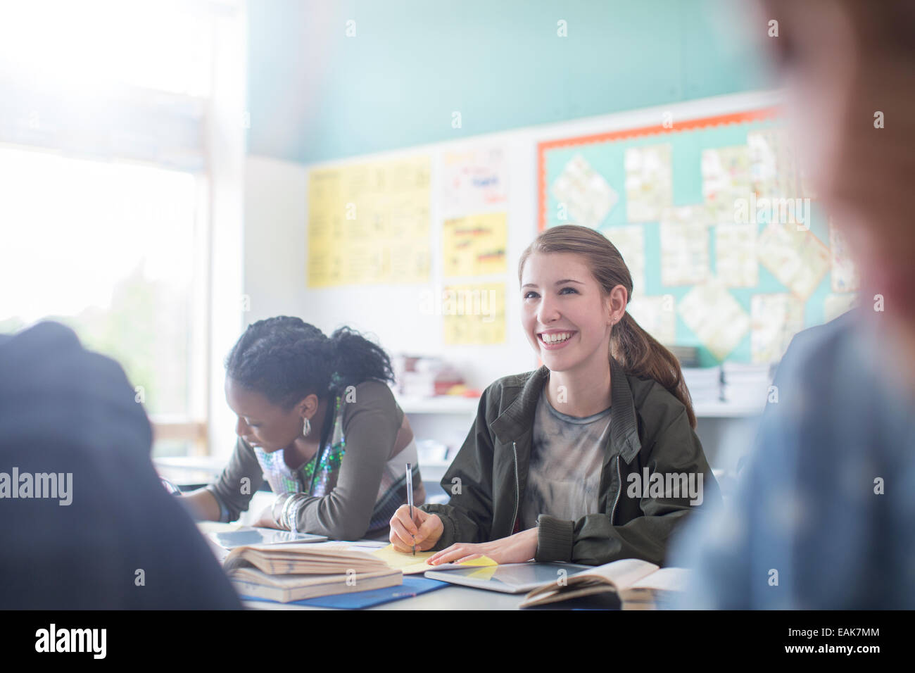 Children sitting desks in classroom hi-res stock photography and images ...