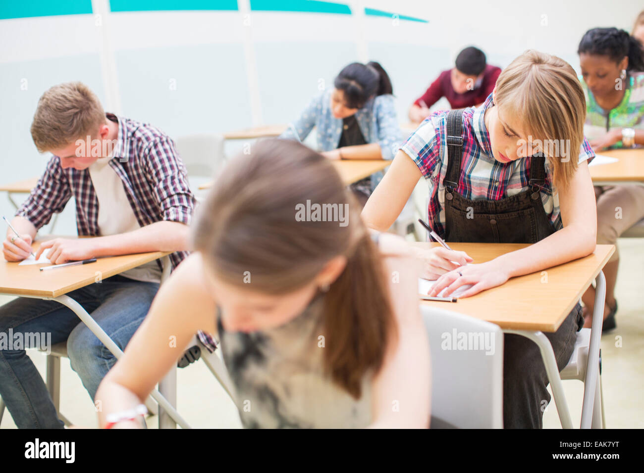 Students writing their GCSE exam in classroom Stock Photo - Alamy