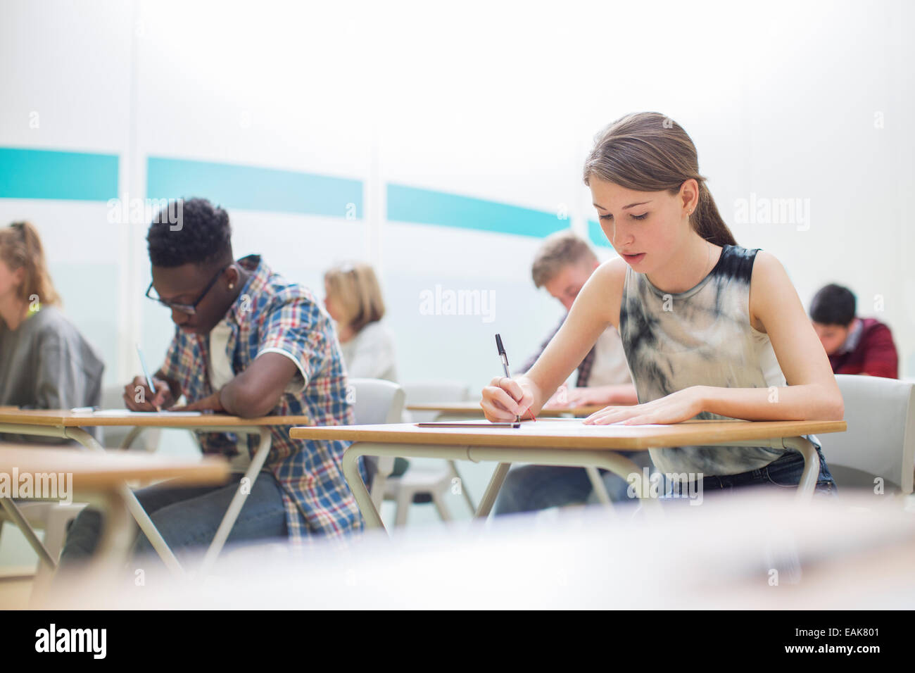 Students writing their GCSE exam in classroom Stock Photo - Alamy