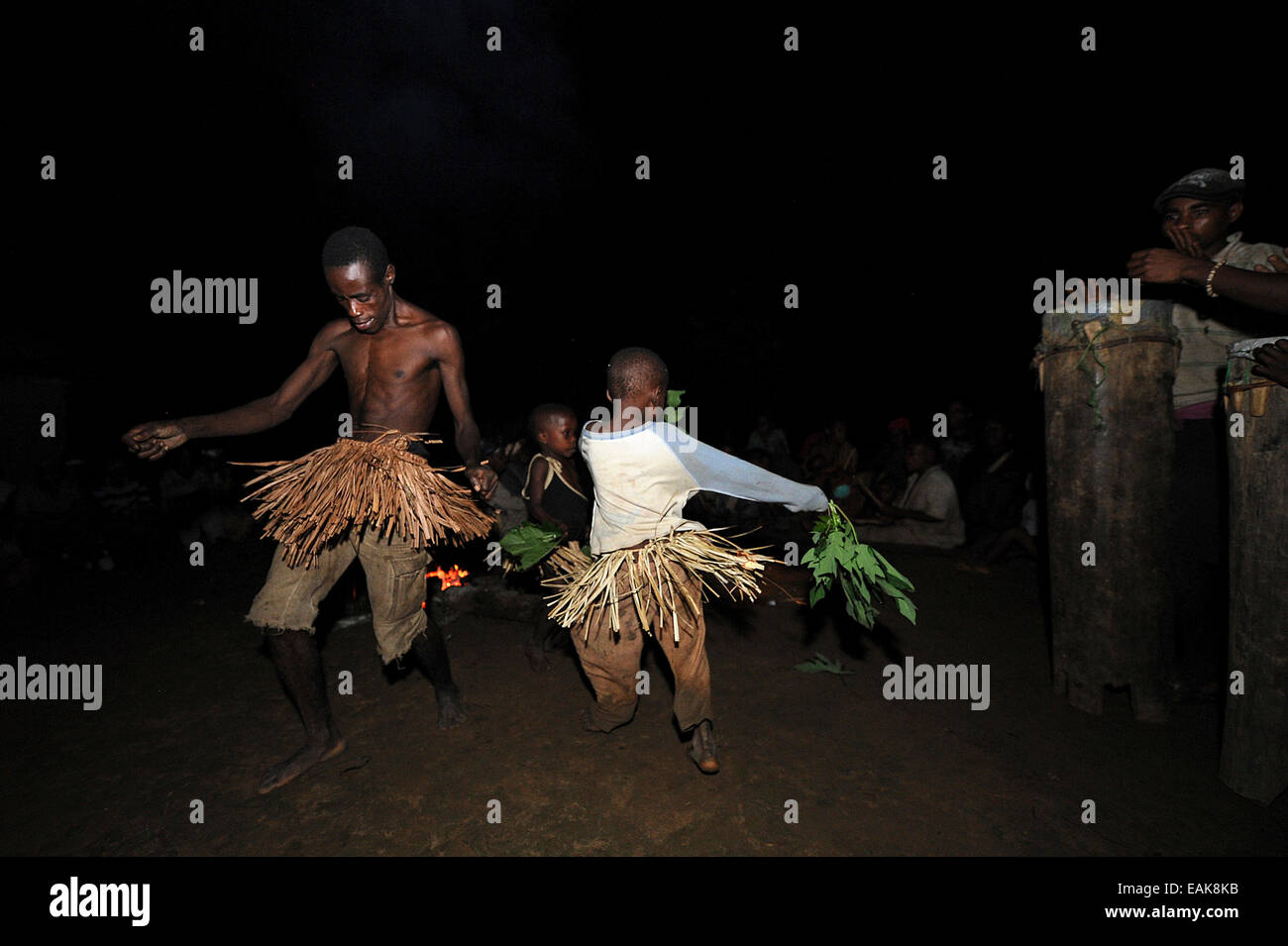 Pygmies of the Bakola people celebrating with song and dance, at night ...
