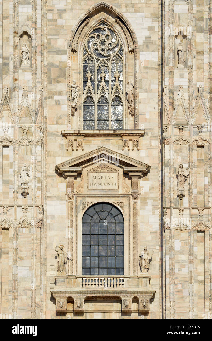 Window over the main portal of the west facade of Milan Cathedral or ...