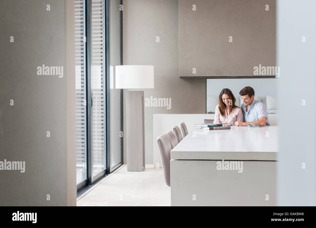 Dining long table man and woman hi-res stock photography and images - Alamy