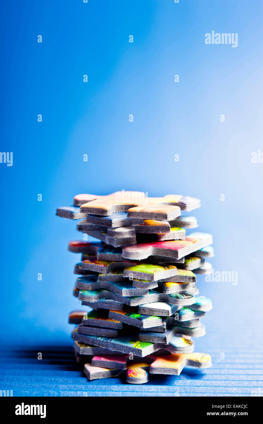 stack of jigsaw puzzle pieces Stock Photo - Alamy