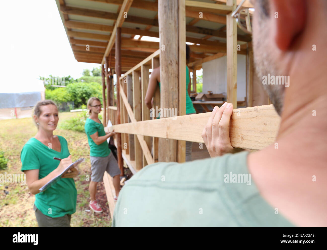 Men building wooden structure hi-res stock photography and images - Alamy