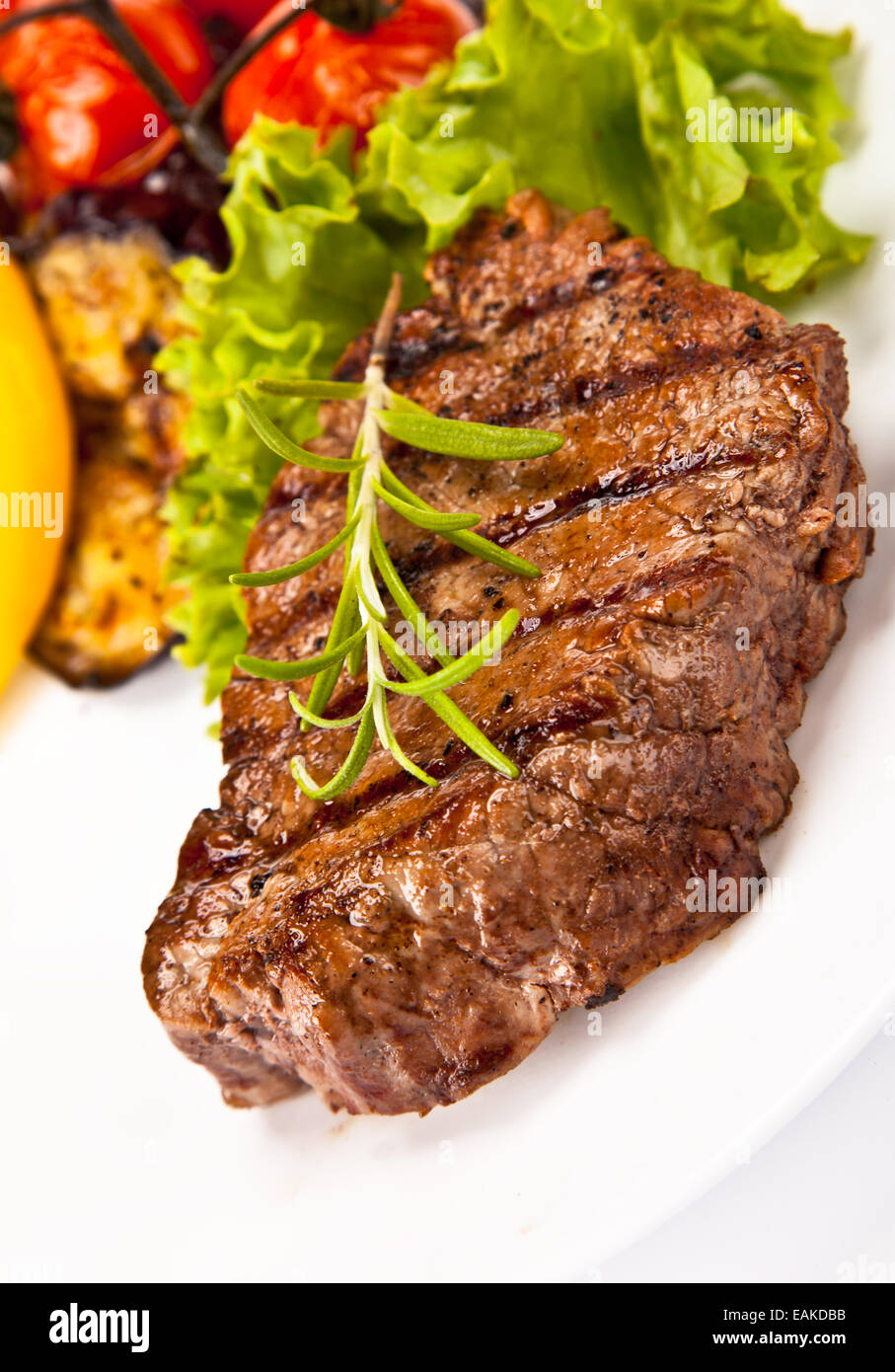 Delicious beef steak isolated on white background Stock Photo - Alamy