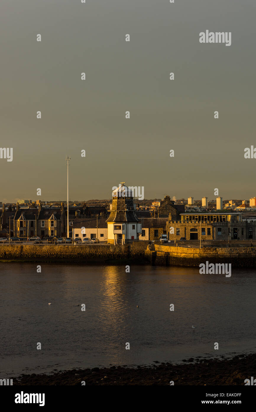 Old harbour master's building at sunset Stock Photo - Alamy
