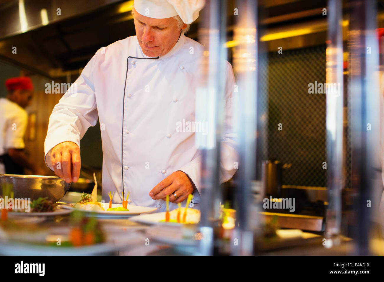 Chef preparing fancy meal in kitchen Stock Photo - Alamy