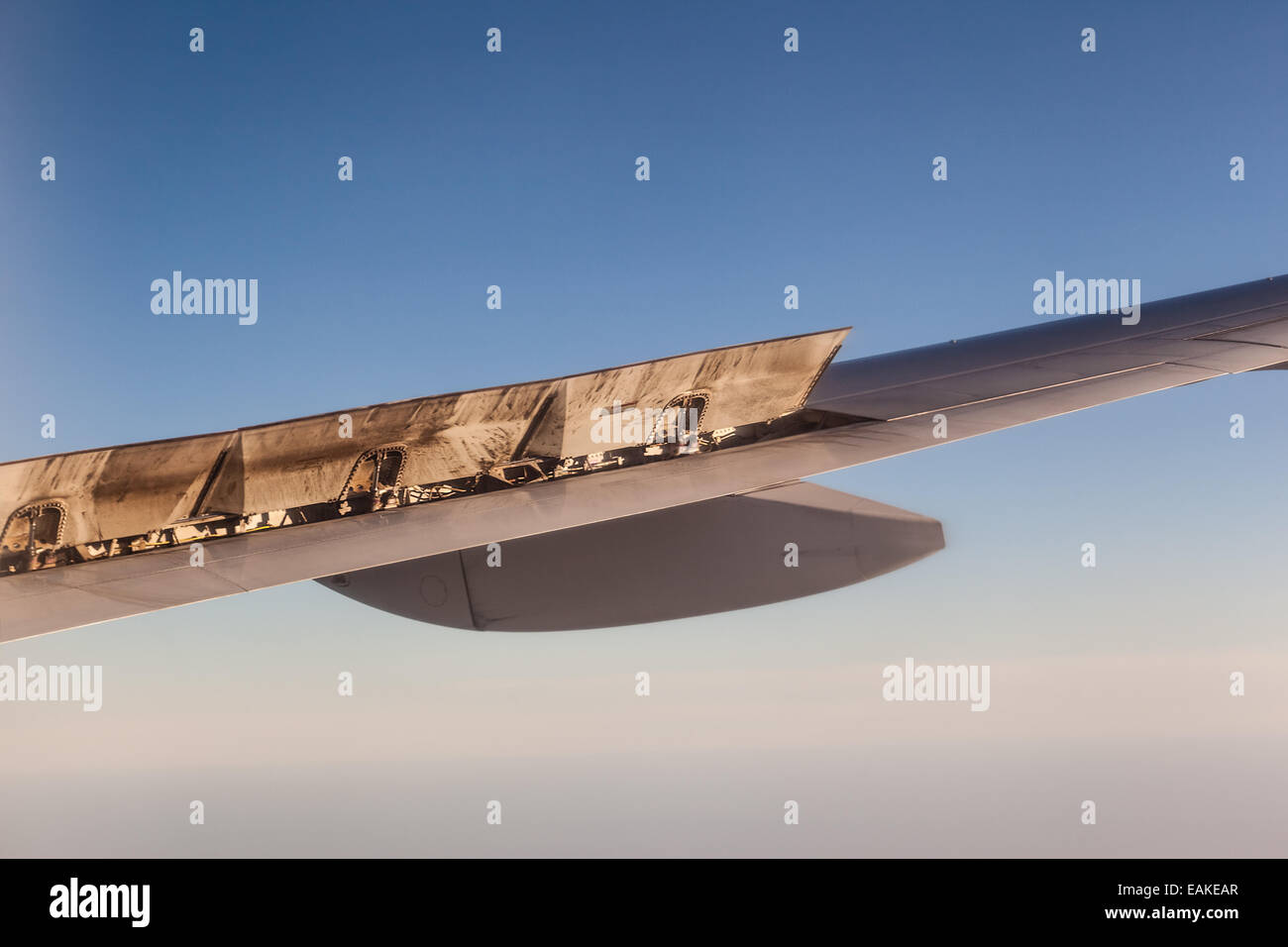 detail of the wing of a commercial airplane during flight Stock Photo ...