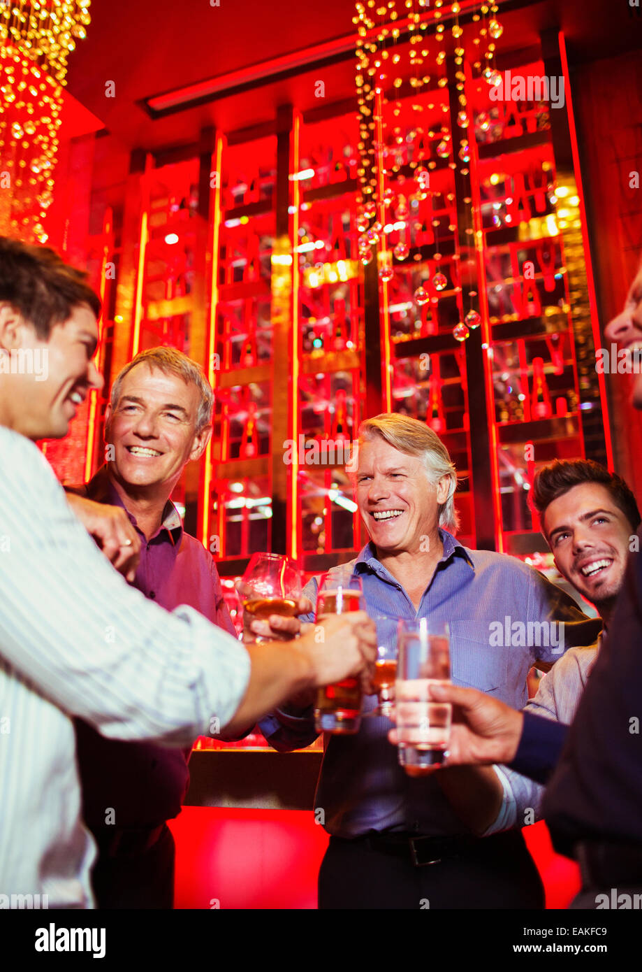 Men enjoying themselves at party Stock Photo - Alamy
