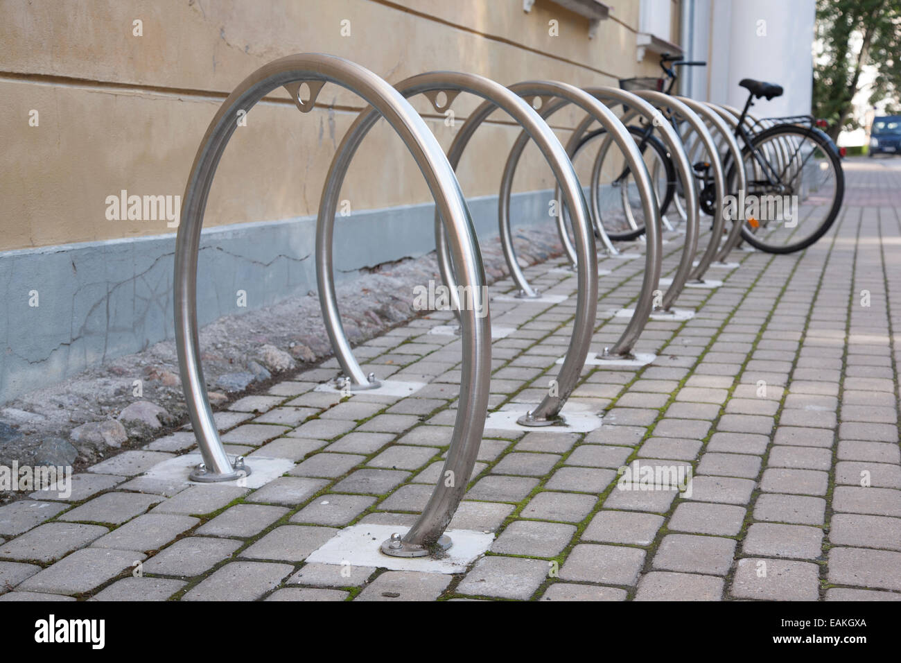 Cycle locked to pole hi-res stock photography and images - Alamy