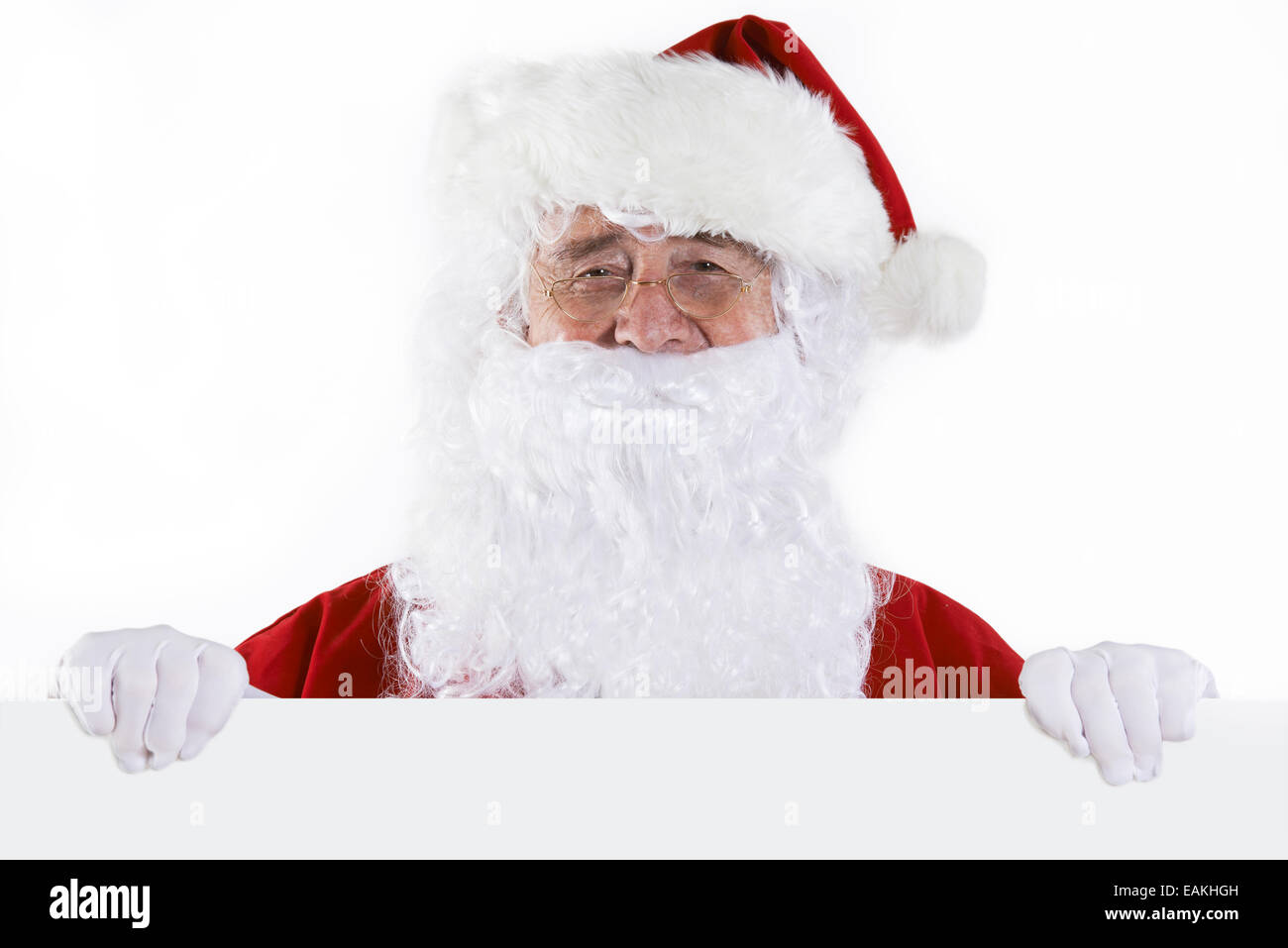 Santa claus holding a blank sign hi-res stock photography and images ...