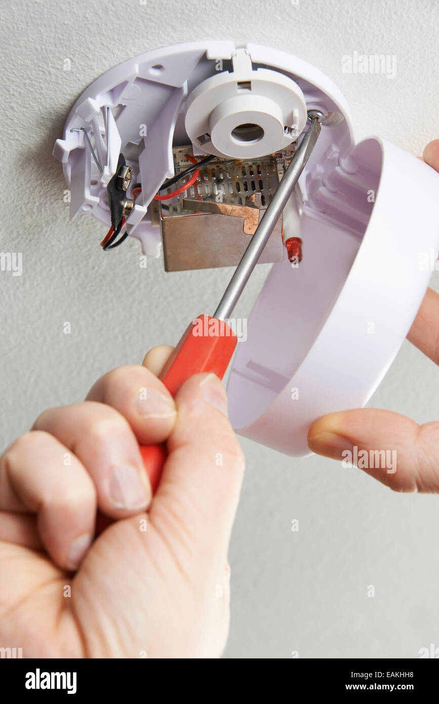 Installing smoke detector hi-res stock photography and images - Alamy