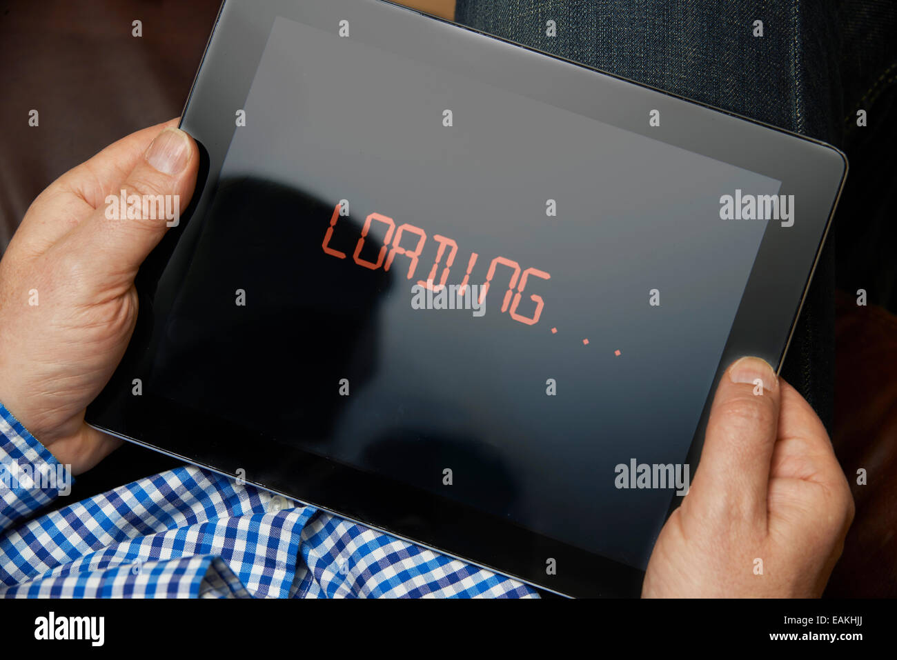 Slow Internet Connection On Digital Tablet Stock Photo - Alamy